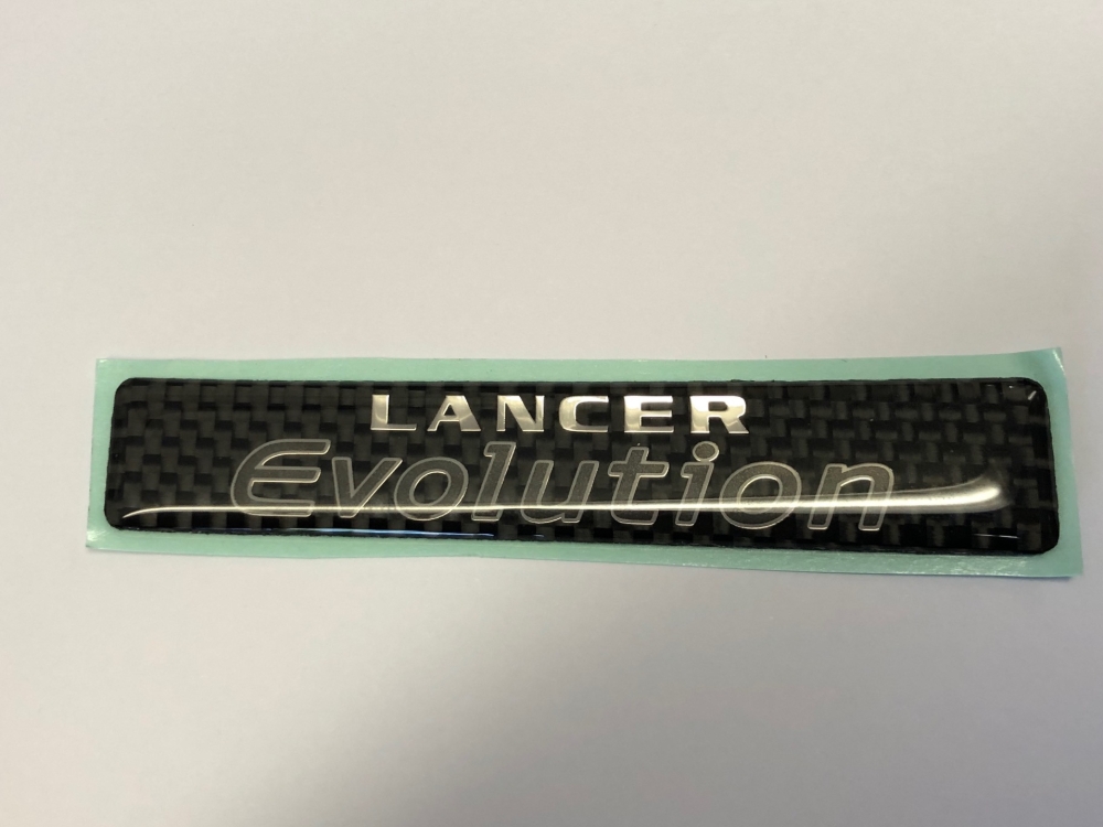 Genuine Mitsubishi centre console badge “Lancer Evolution”- *Special ...